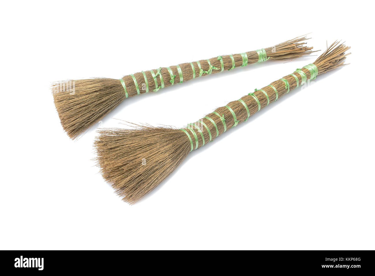 Two Paint brush isolated on a white background, broom brush Tied with ...