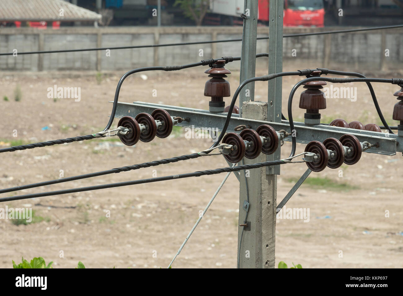 electricity post high voltage cable lines, poles are connected together ...