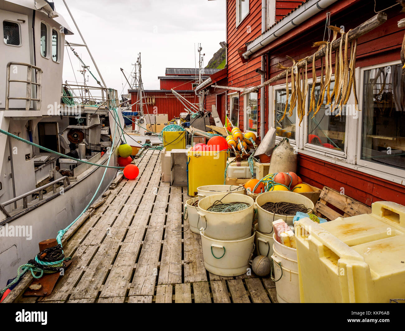 Typical Norwegian fishing village dock, complete with stockfish hanging ...