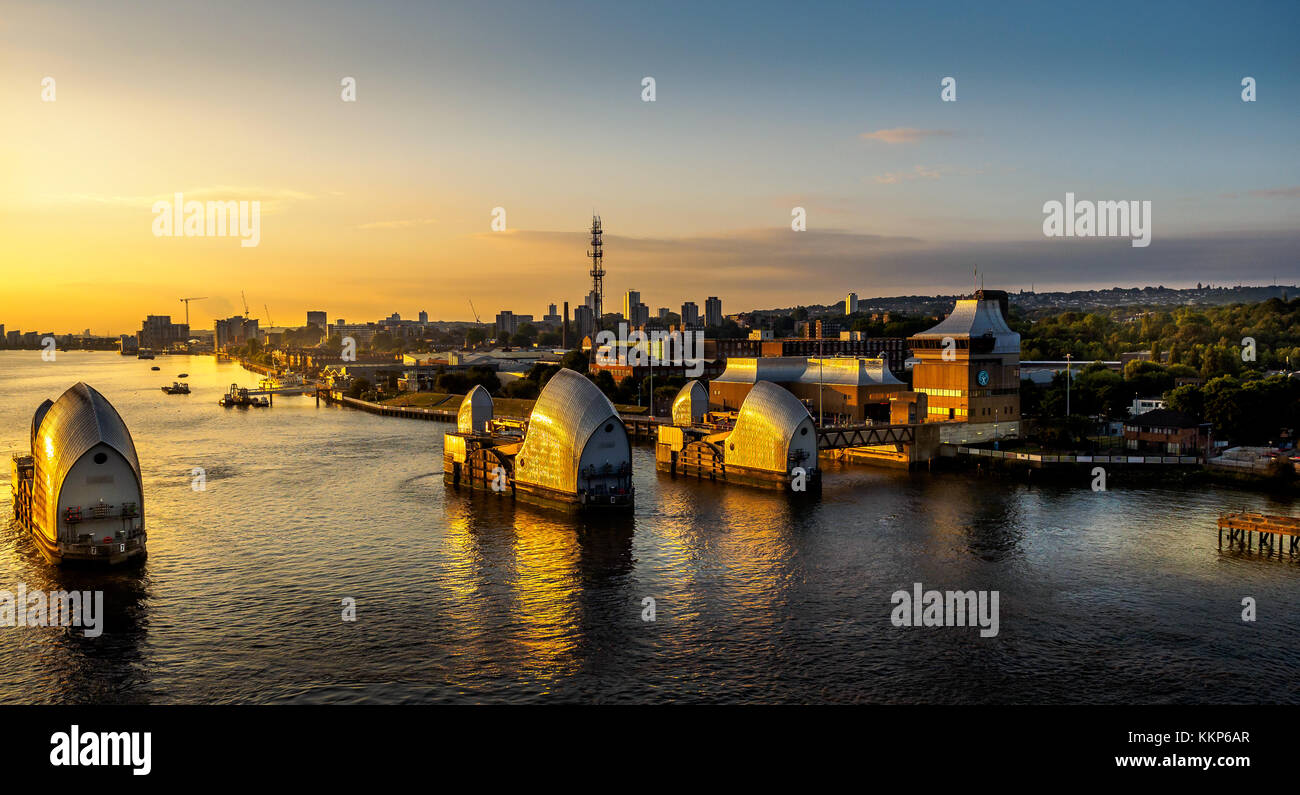 Thames tidal barrier at sunrise Stock Photo - Alamy