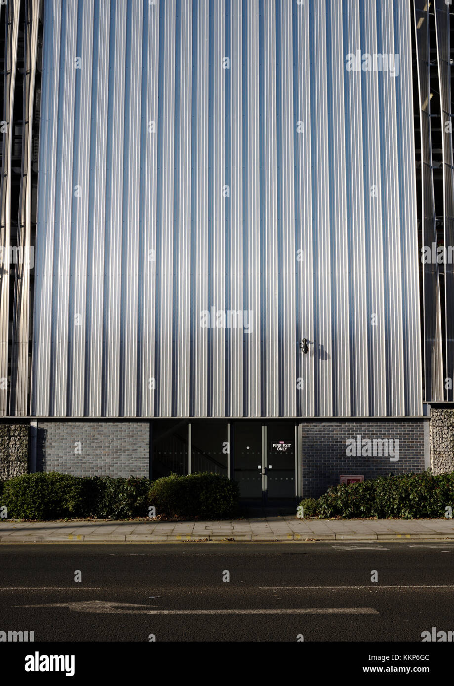 Steel frame Multi storey car park with vertical metal cladding and ...