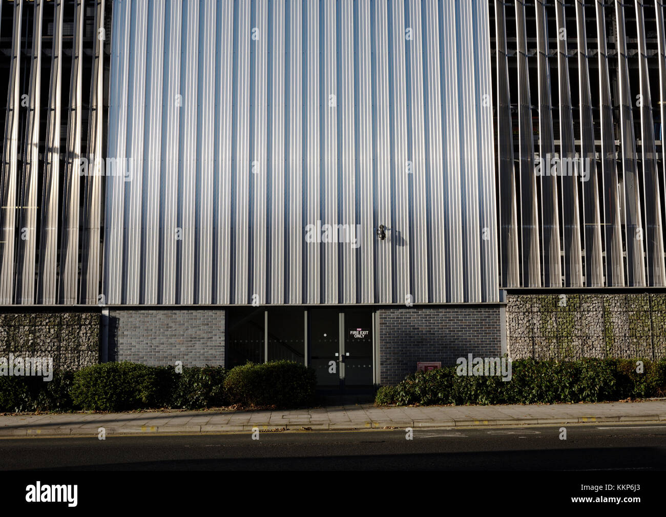 Steel frame Multi storey car park with vertical metal cladding and ...