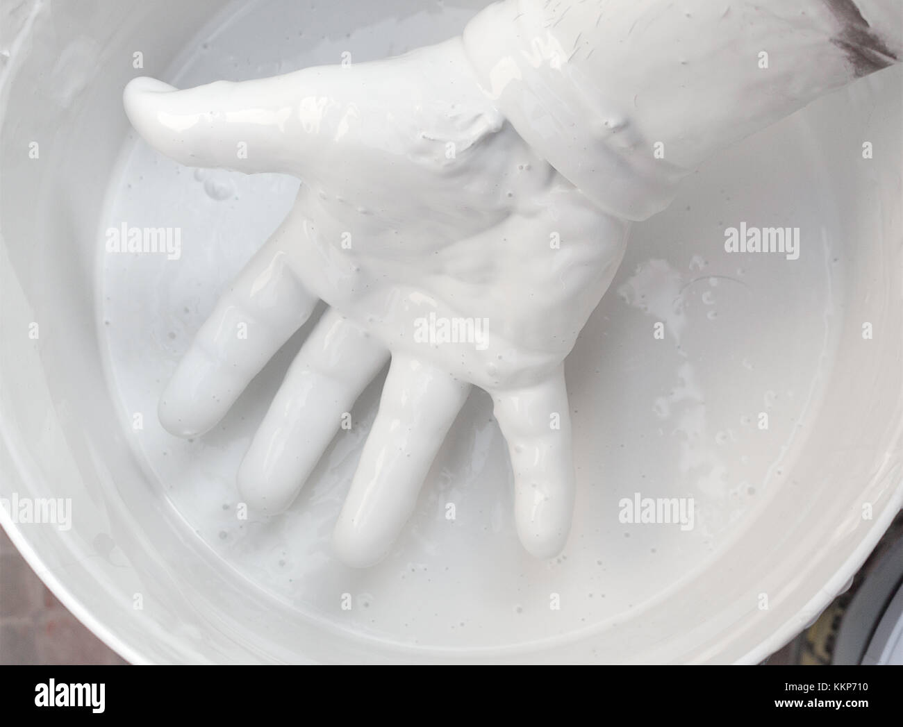 hand with White colors mixed, Painters mixed by hand with color ...