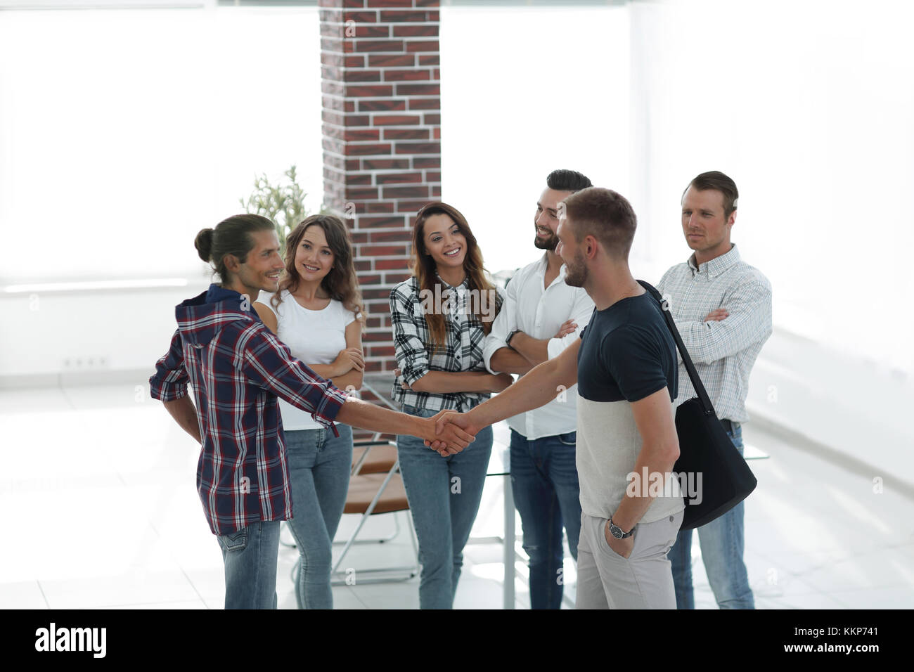 handshake Manager and customer in the office Stock Photo - Alamy