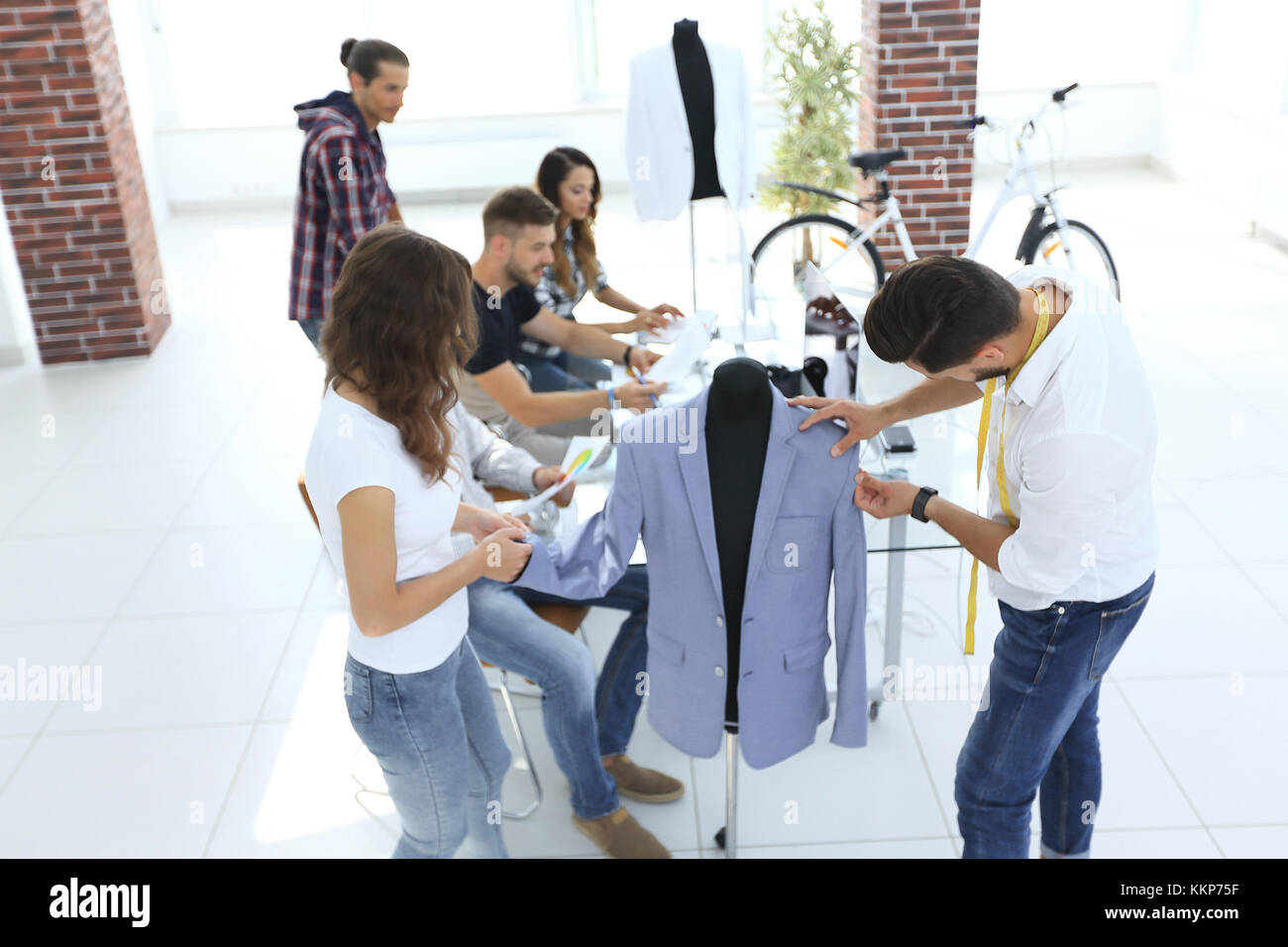 designers working on new models of clothes Stock Photo - Alamy
