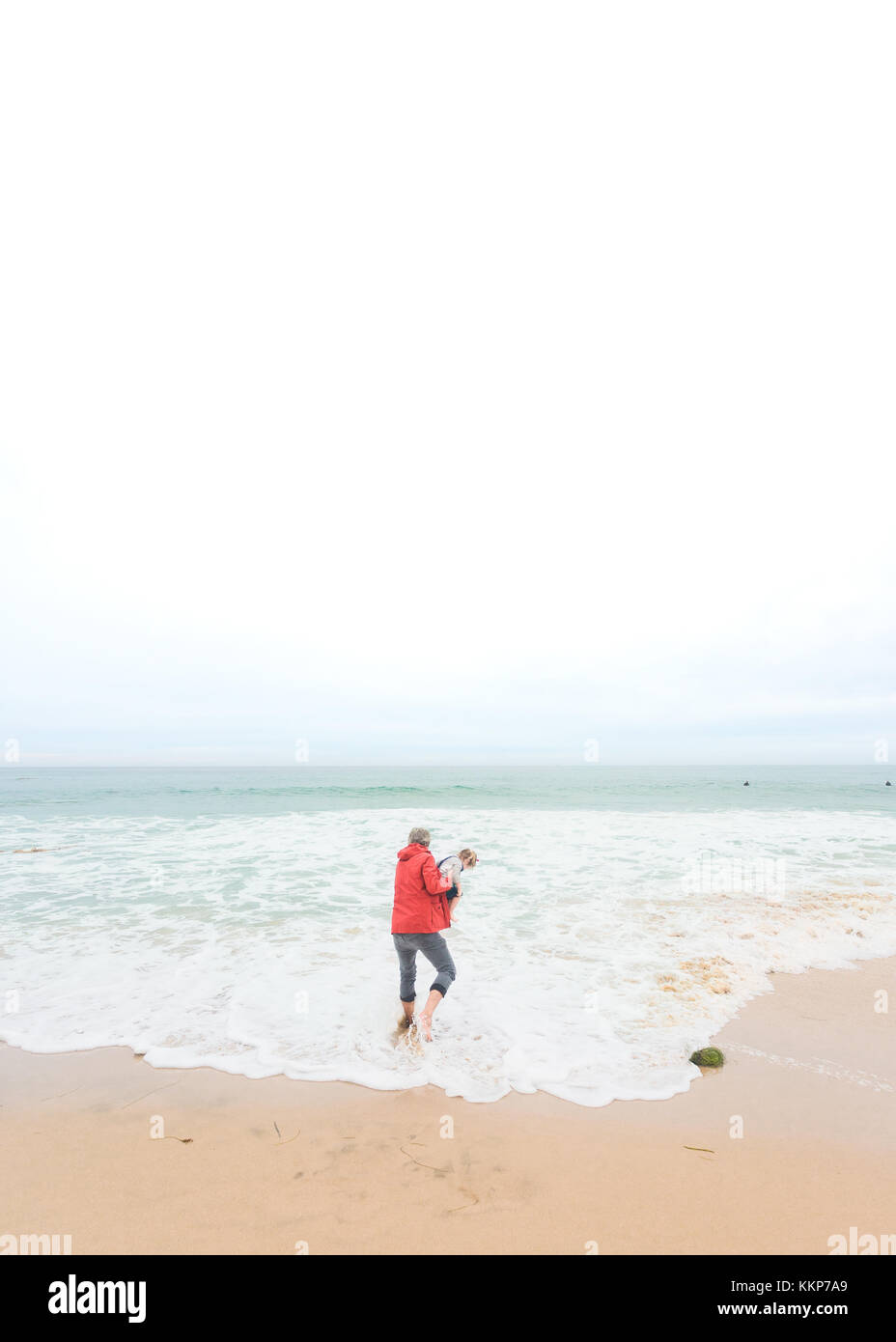 Father Daughter Playing in Ocean Stock Photo - Alamy