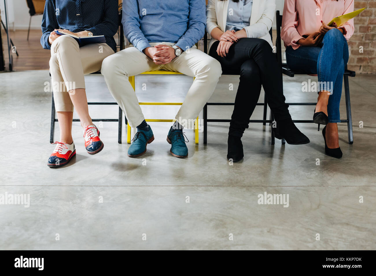 Job room waiting legs hi-res stock photography and images - Alamy