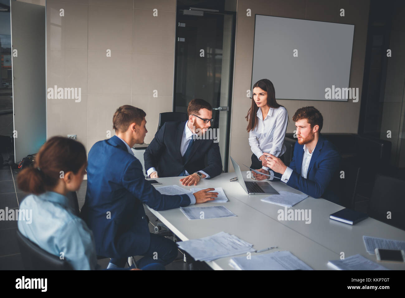 Corporate business team and manager in a meeting Stock Photo - Alamy