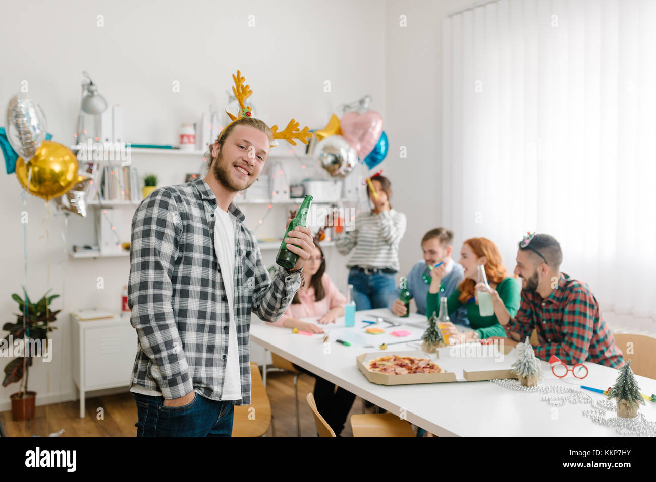 Greeting office party guests Stock Photo - Alamy