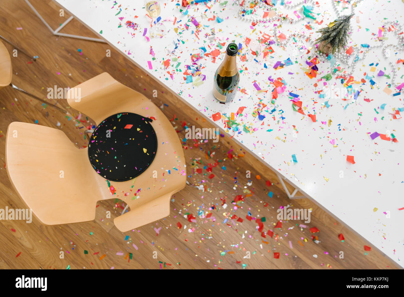Confetti everywhere in the office after the party Stock Photo - Alamy
