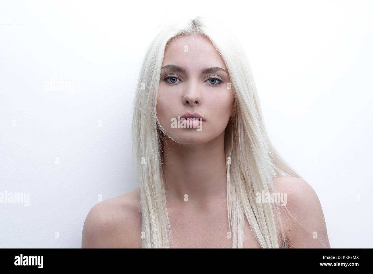 Close-up of a worried beautiful woman blonde Stock Photo - Alamy