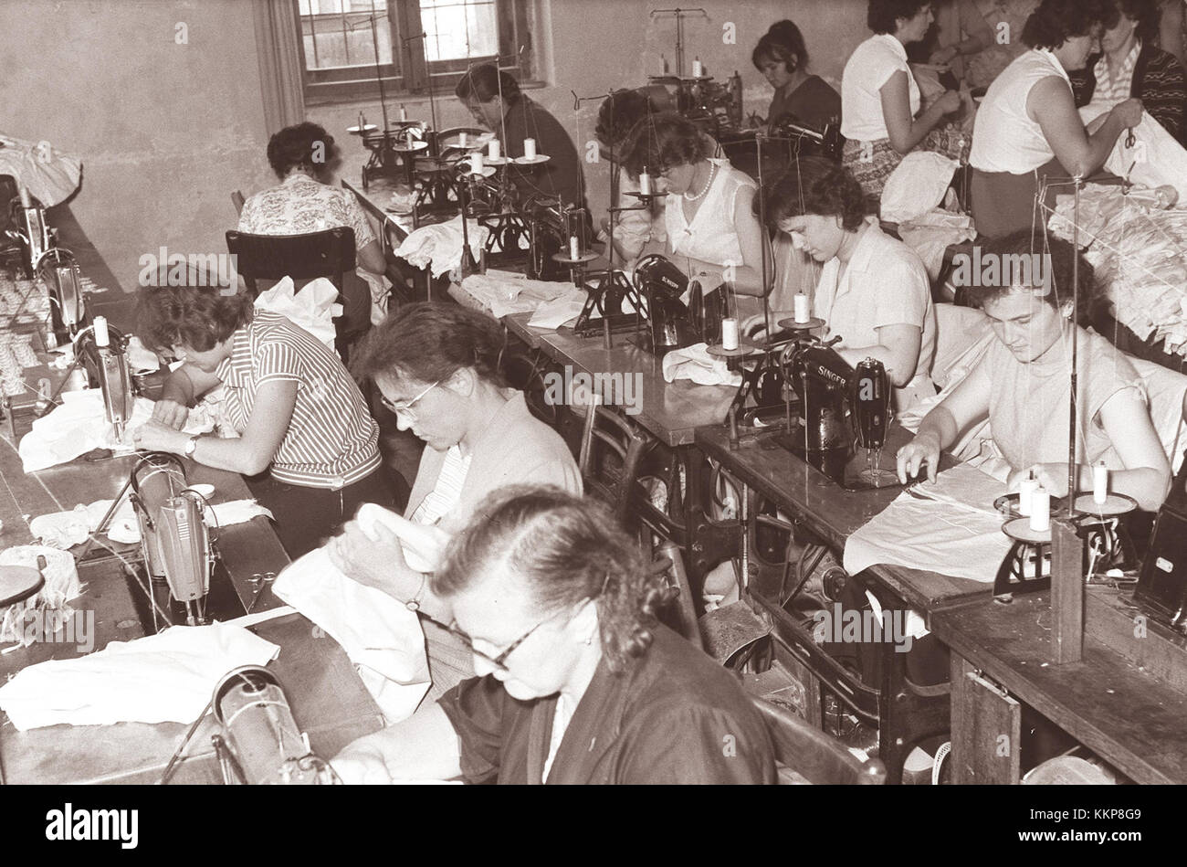This photograph from 1961 shows a workshop of the fashion company Moda ...