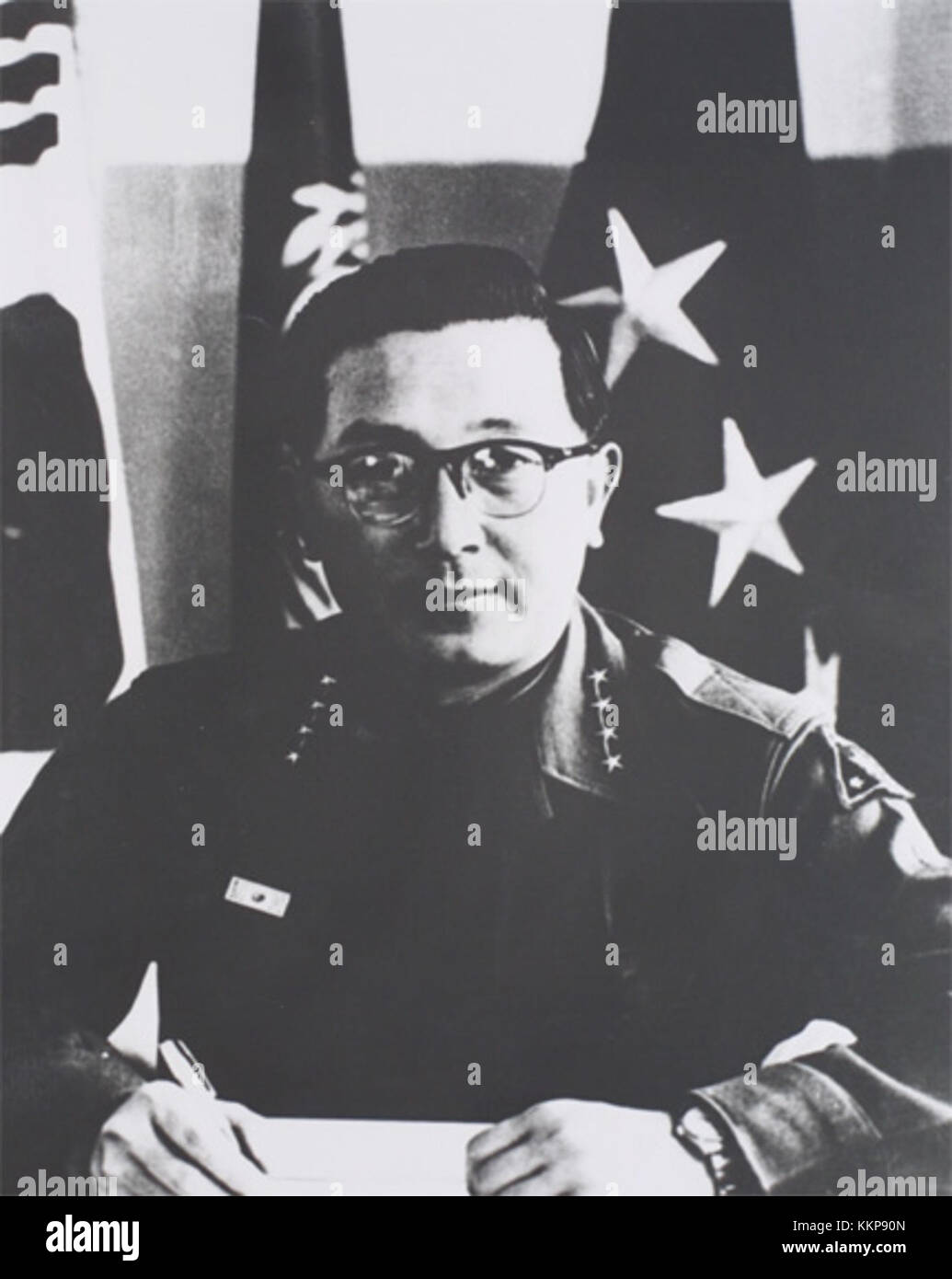 A photograph of Jong Il Gwon, captured in 1954, showing the prominent ...