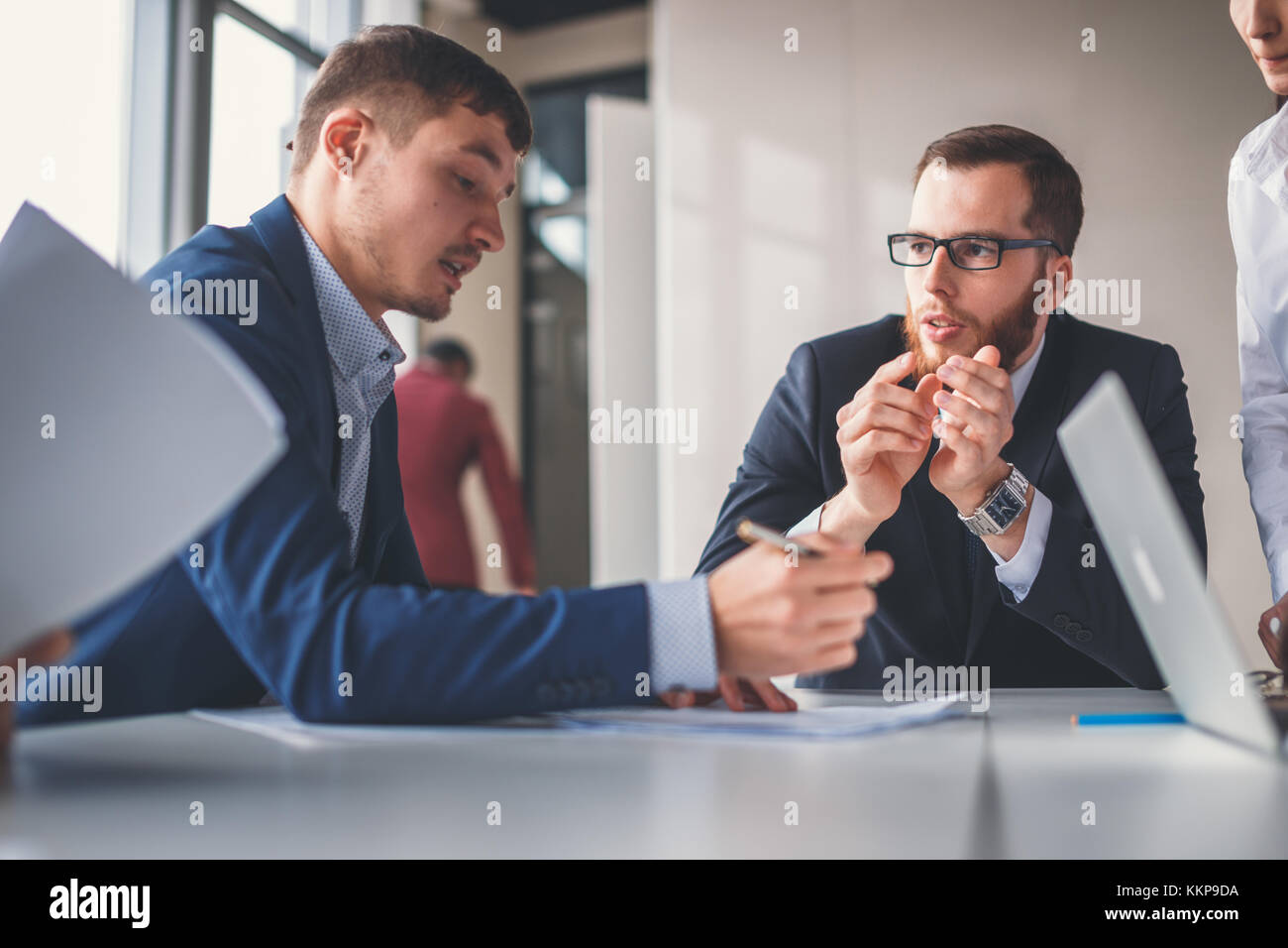 Corporate business team and manager in a meeting Stock Photo - Alamy