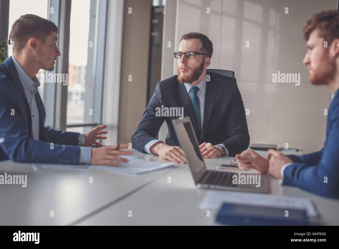 Corporate business team and manager in a meeting Stock Photo - Alamy