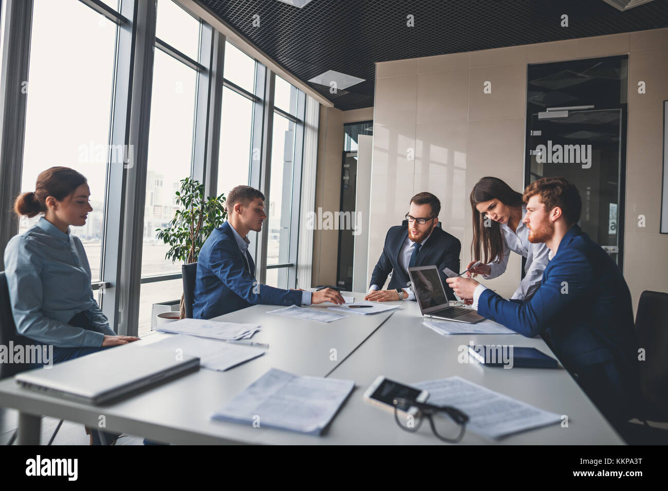 Corporate business team and manager in a meeting Stock Photo - Alamy