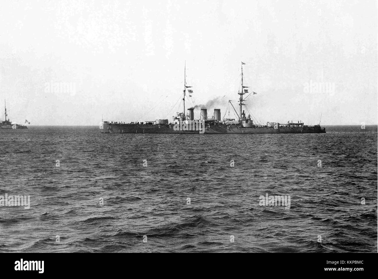 This refers to the Ryurik, a Russian Imperial Navy warship, depicted in ...