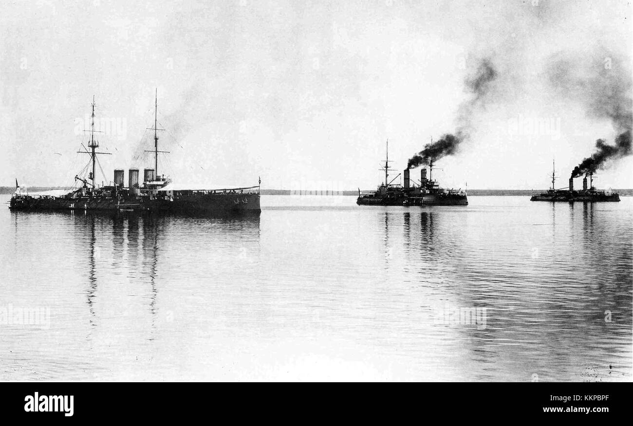 The image depicts the Russian naval ships Ryurik, Slava, and Tsarevich ...