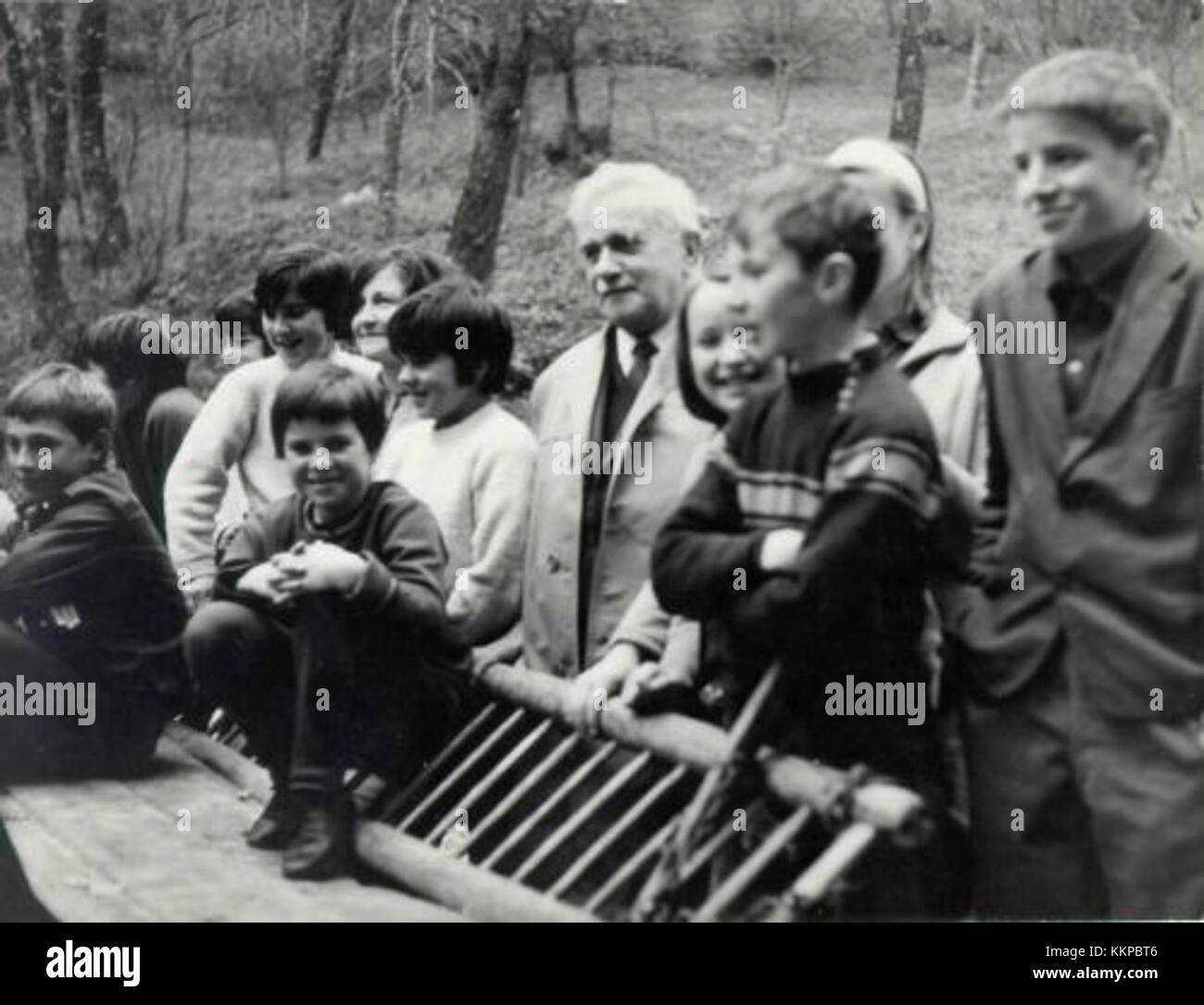 This photograph shows France Bevk, a Slovenian writer, with children at ...