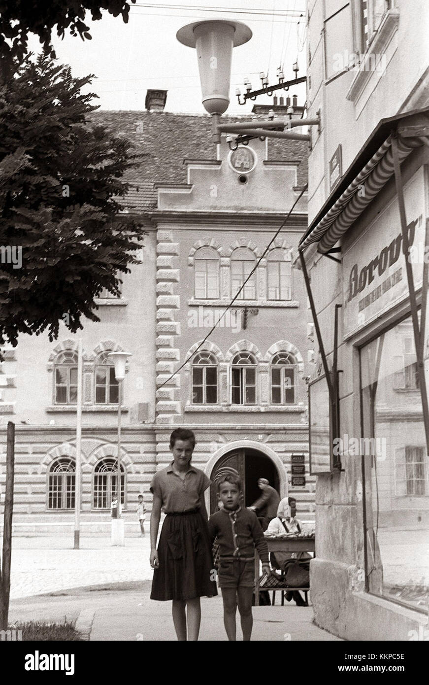 This image from 1958 depicts a scene from Slovenj Gradec, a town in Slovenia. The artwork ...