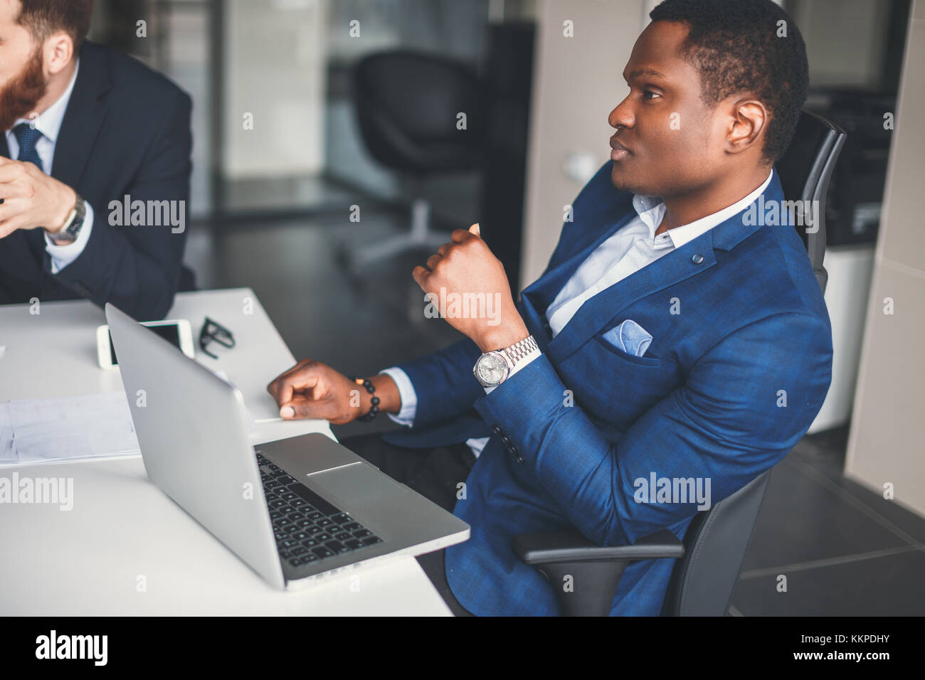 Boss heading a business reunion with partners Stock Photo - Alamy