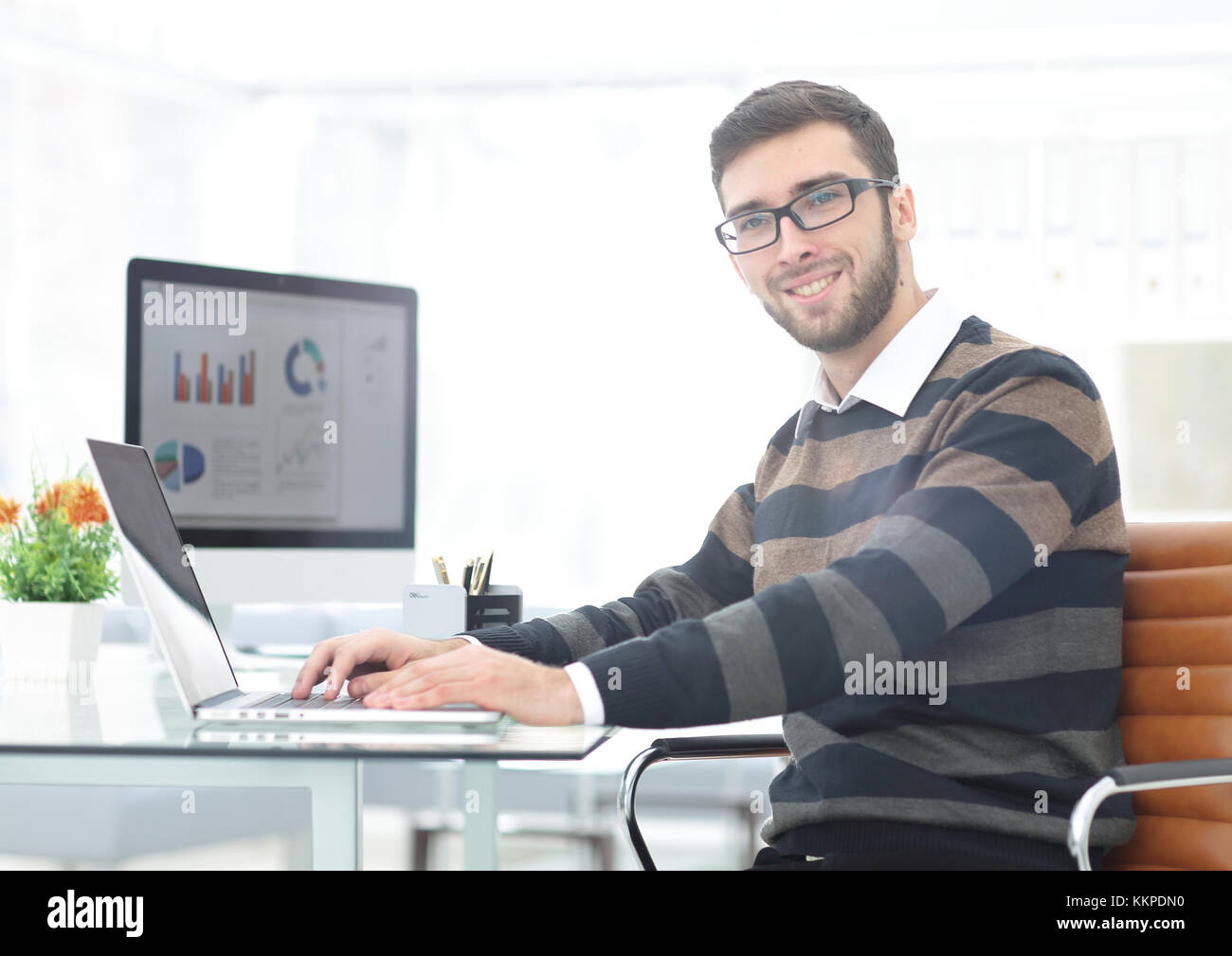 successful employee at a Desk Stock Photo - Alamy