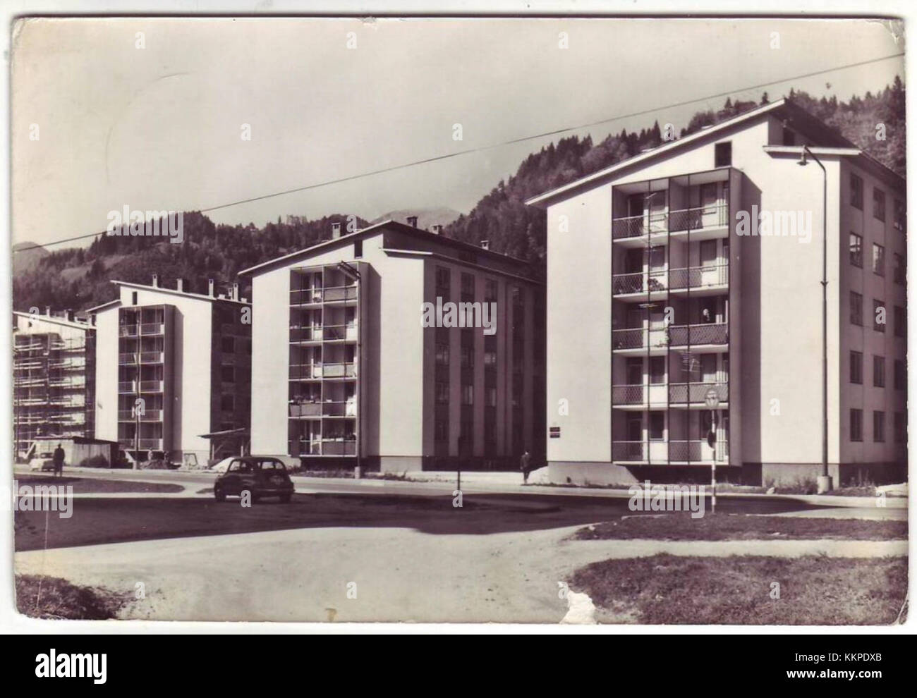 This 1965 postcard depicts the town of Jesenice in Slovenia, capturing ...