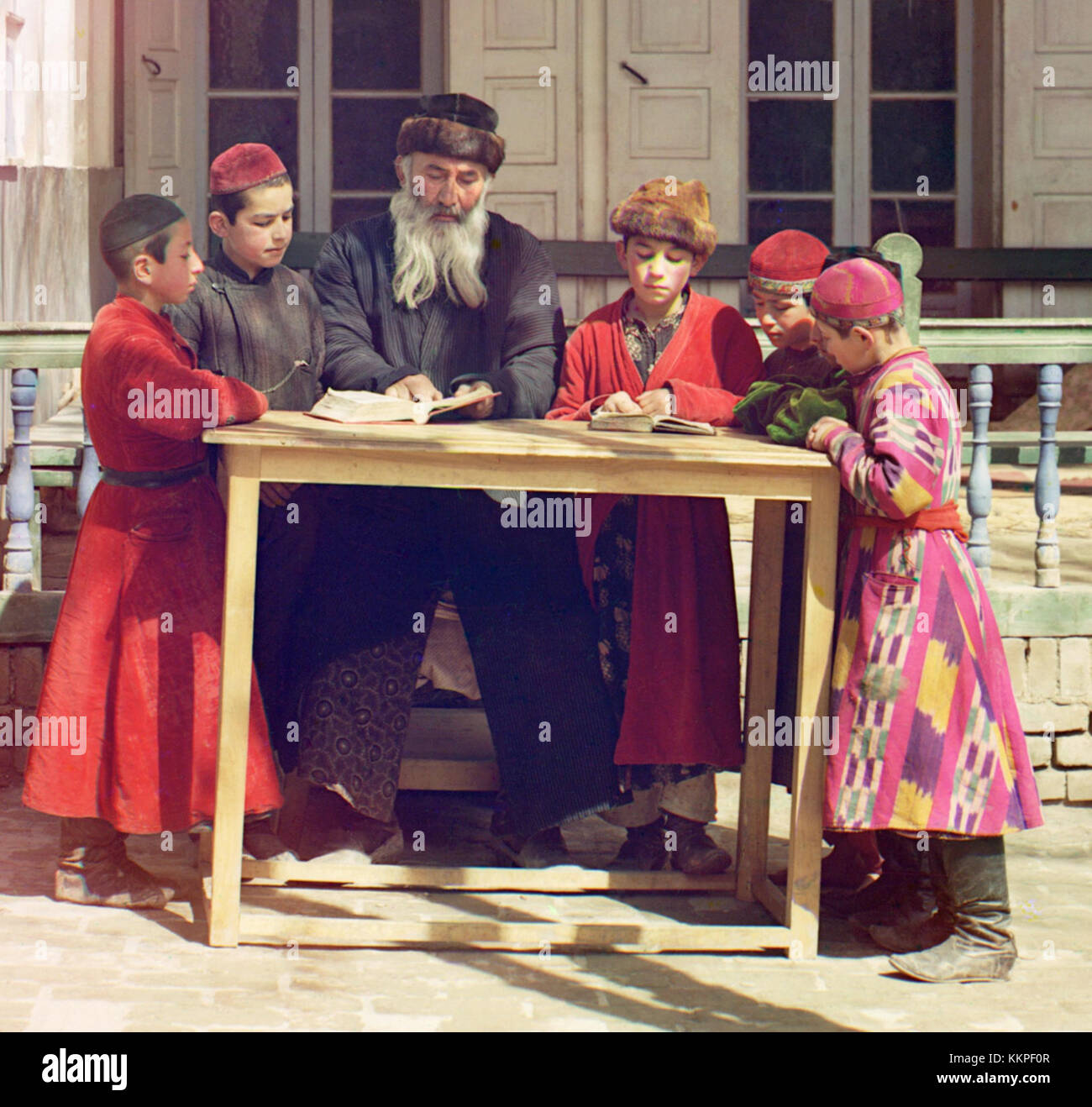 A historical photograph showing Jewish children with their teacher in ...