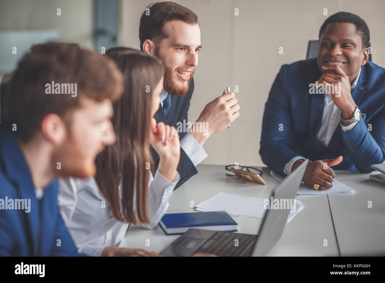 Boss heading a business reunion with partners Stock Photo - Alamy