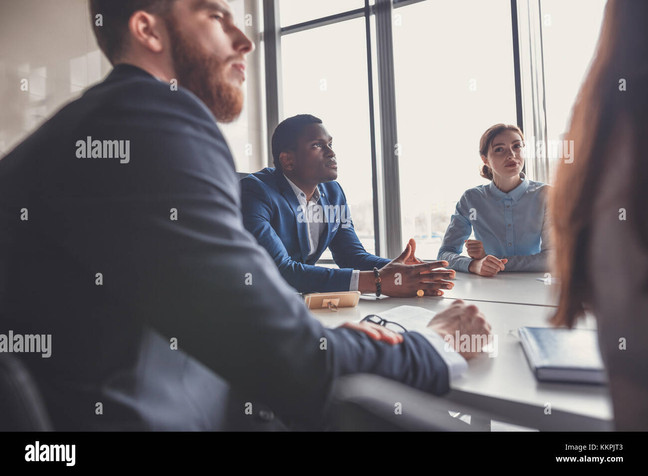 business team and manager in a meeting Stock Photo - Alamy