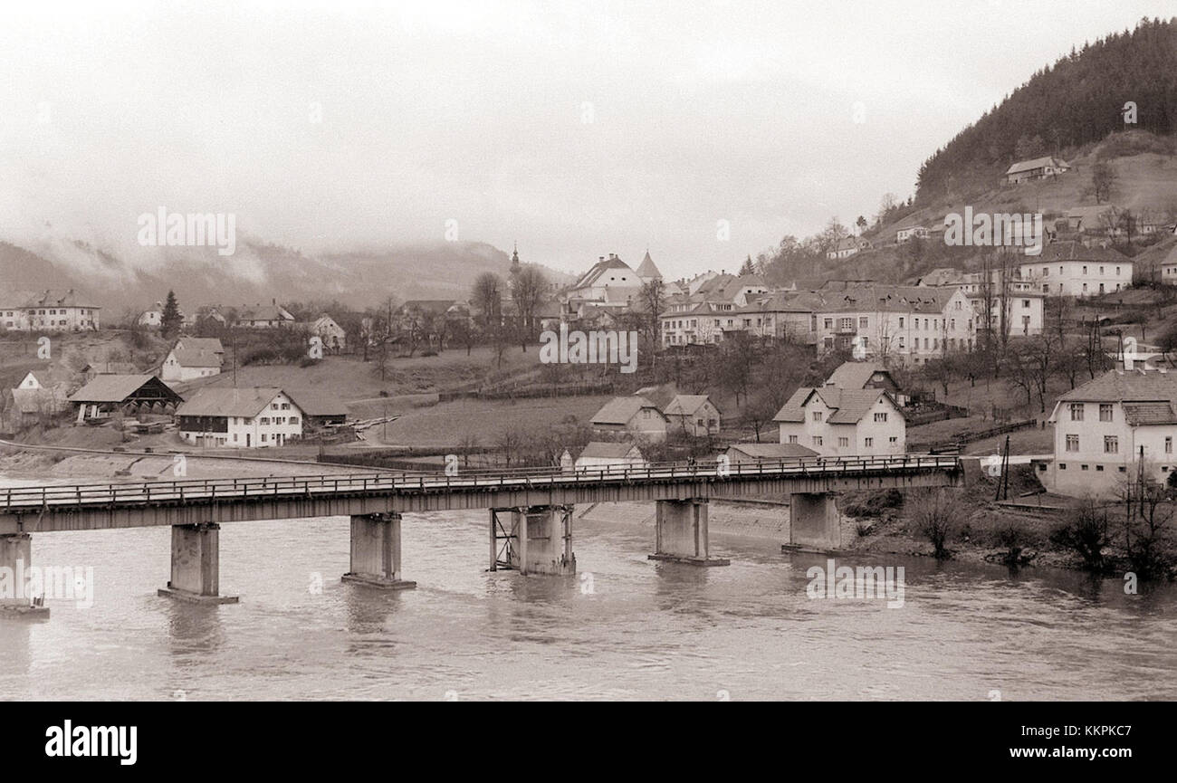 This photograph, taken in 1959, shows a view of the Drava River bridge ...