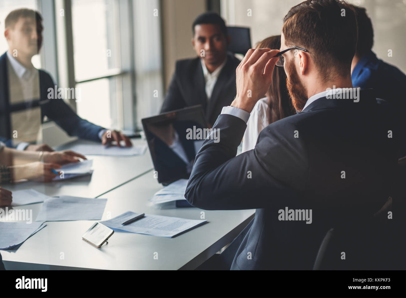 business team and manager in a meeting Stock Photo - Alamy