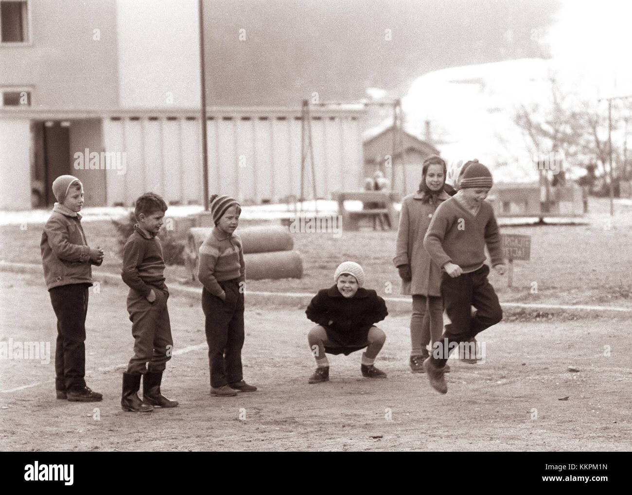 Children playing outdoor 1960s hi-res stock photography and images - Alamy