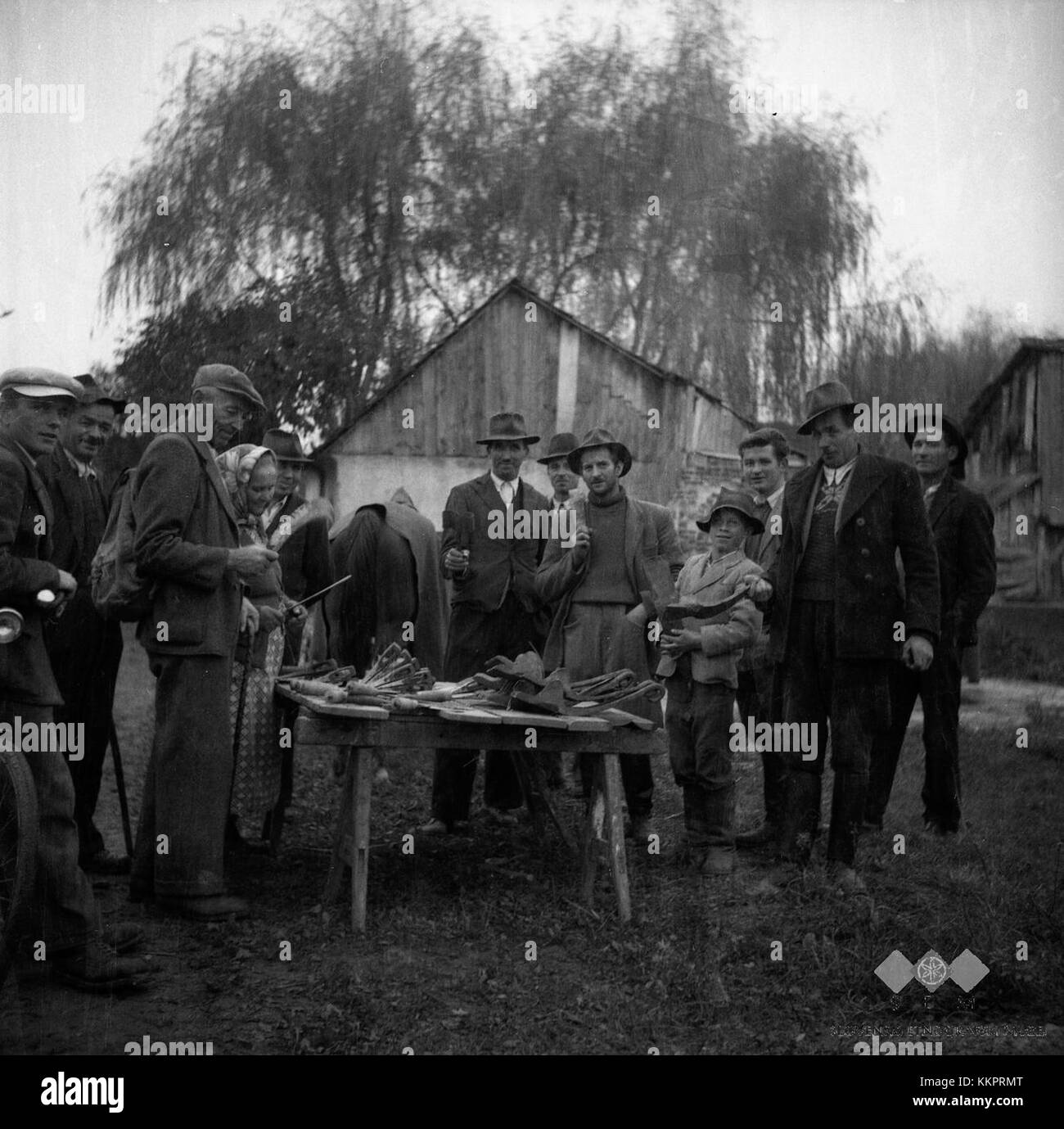 This image captures a scene from the Mokronog fair in 1951, showcasing ...