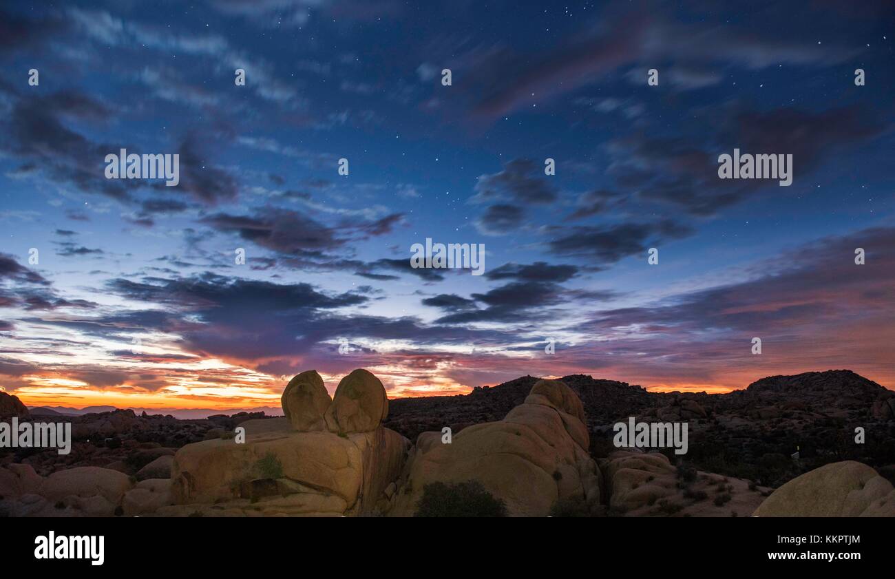 The sun rises over Heartbreak Rock at the Joshua Tree National Park ...