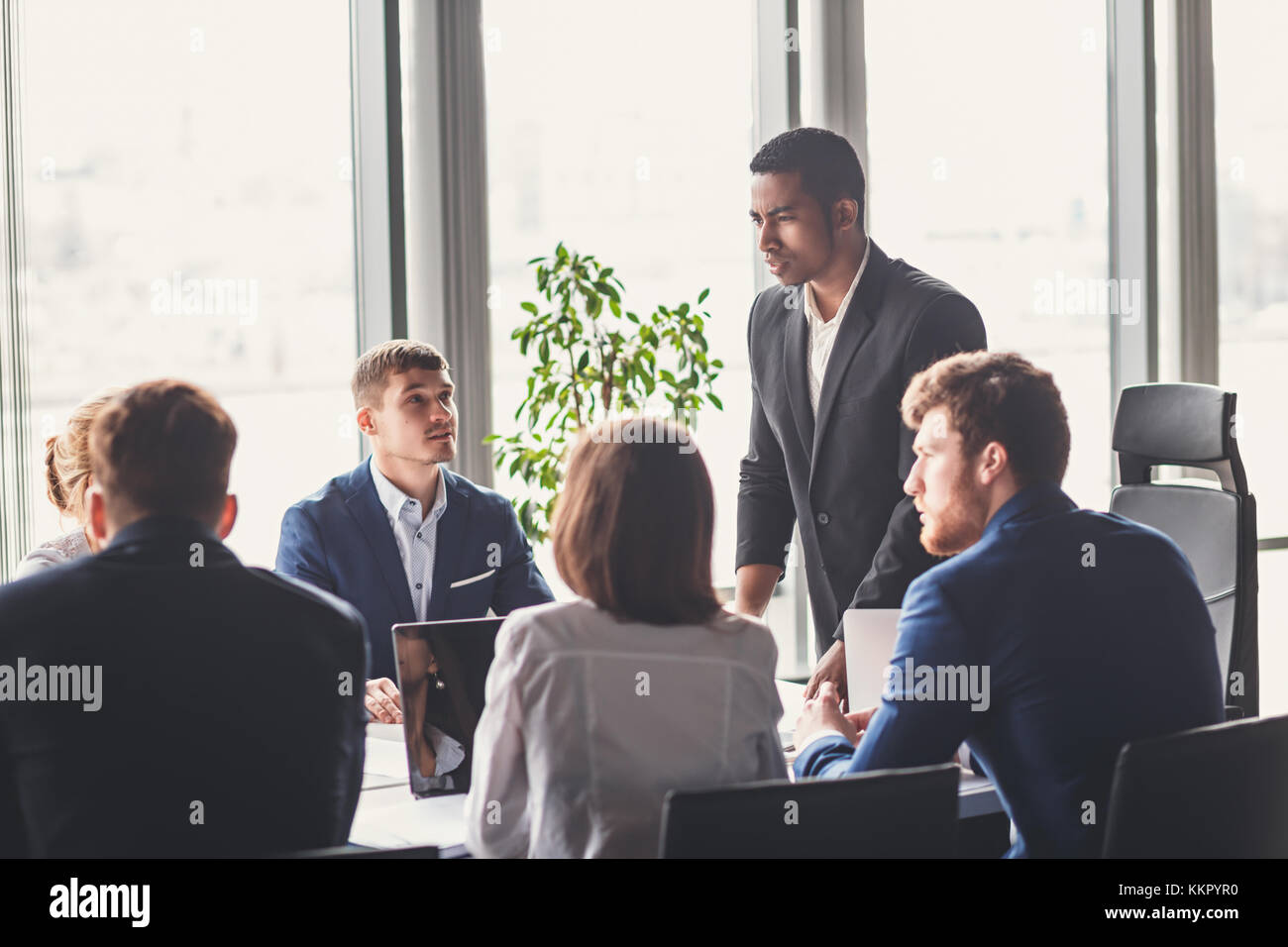 Business people working in modern conference room Stock Photo - Alamy
