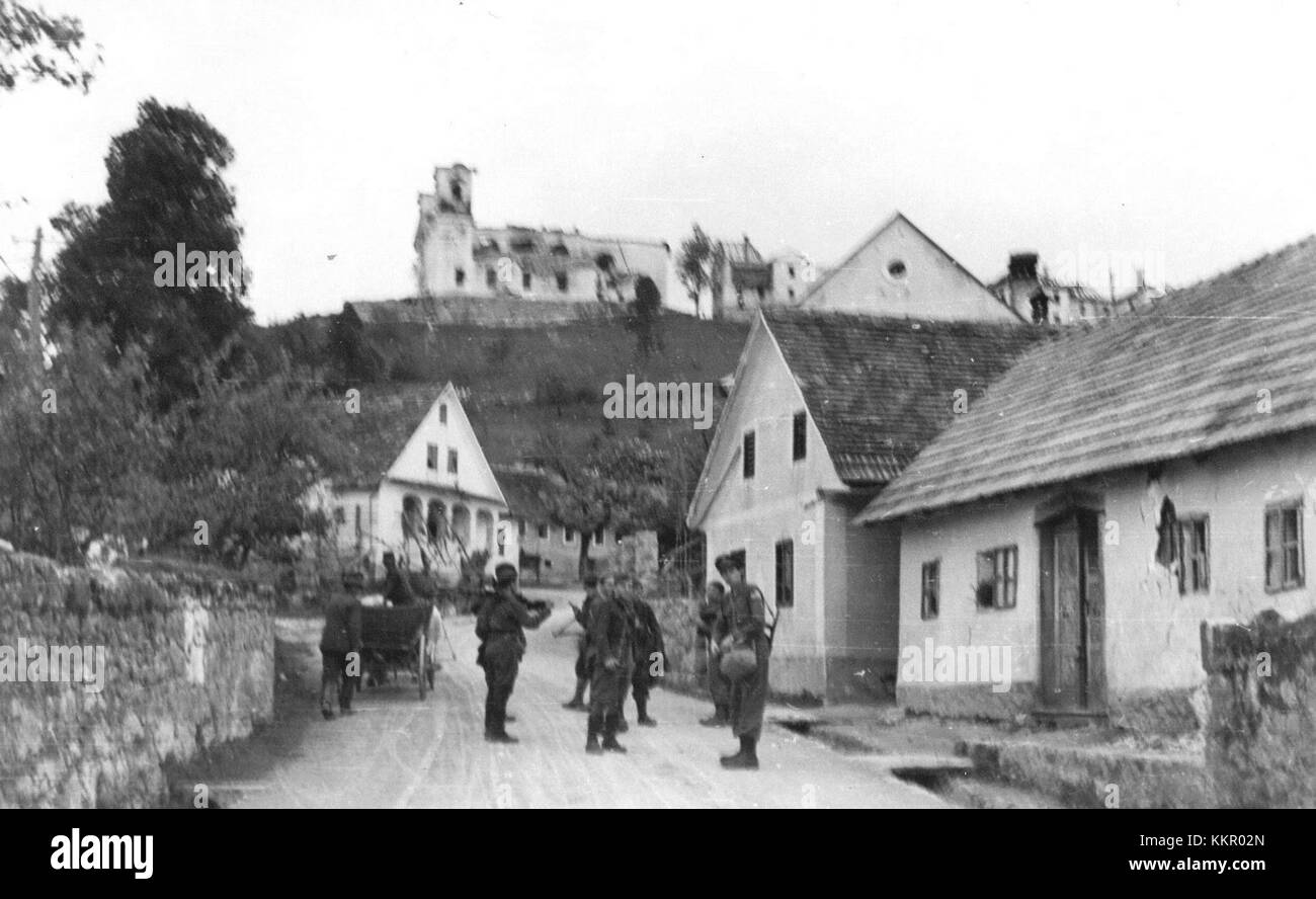 The photograph 'Skupina borcev nekje v Sloveniji 1944' translates to ...