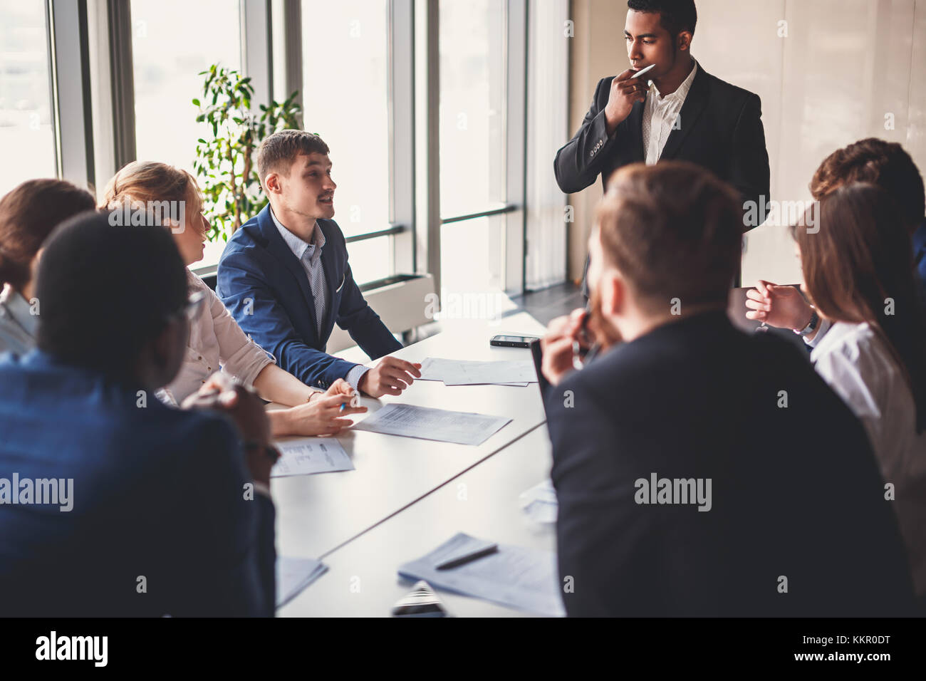 Business people working in modern conference room Stock Photo - Alamy