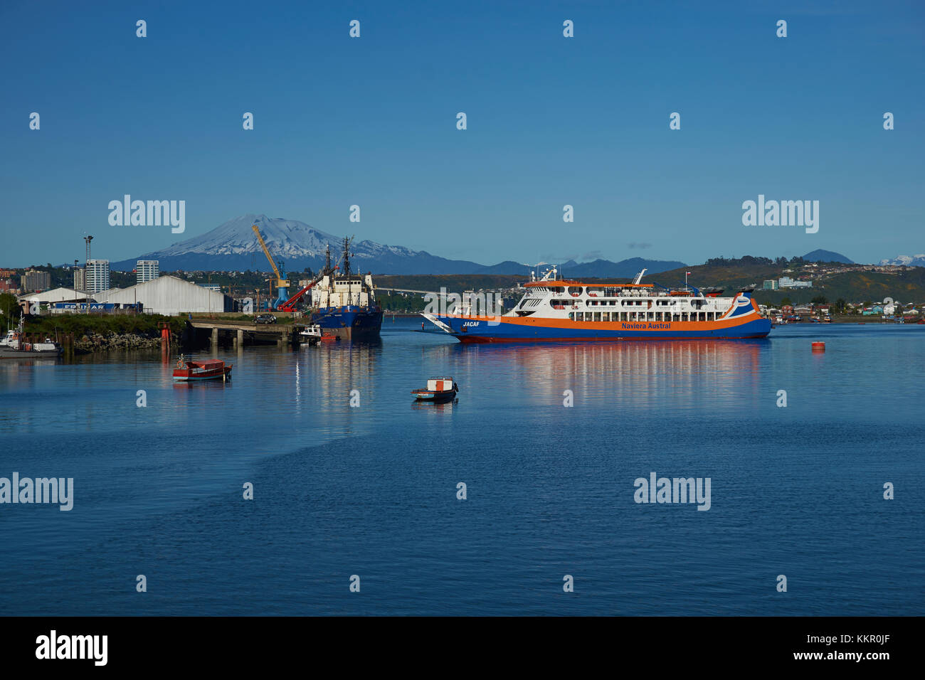 Ferry approaching the loading ramp in preparation for embarking ...