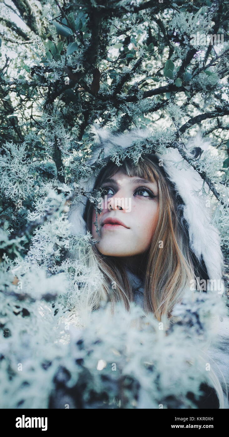 Young woman with a fur hat in a cold day Stock Photo - Alamy