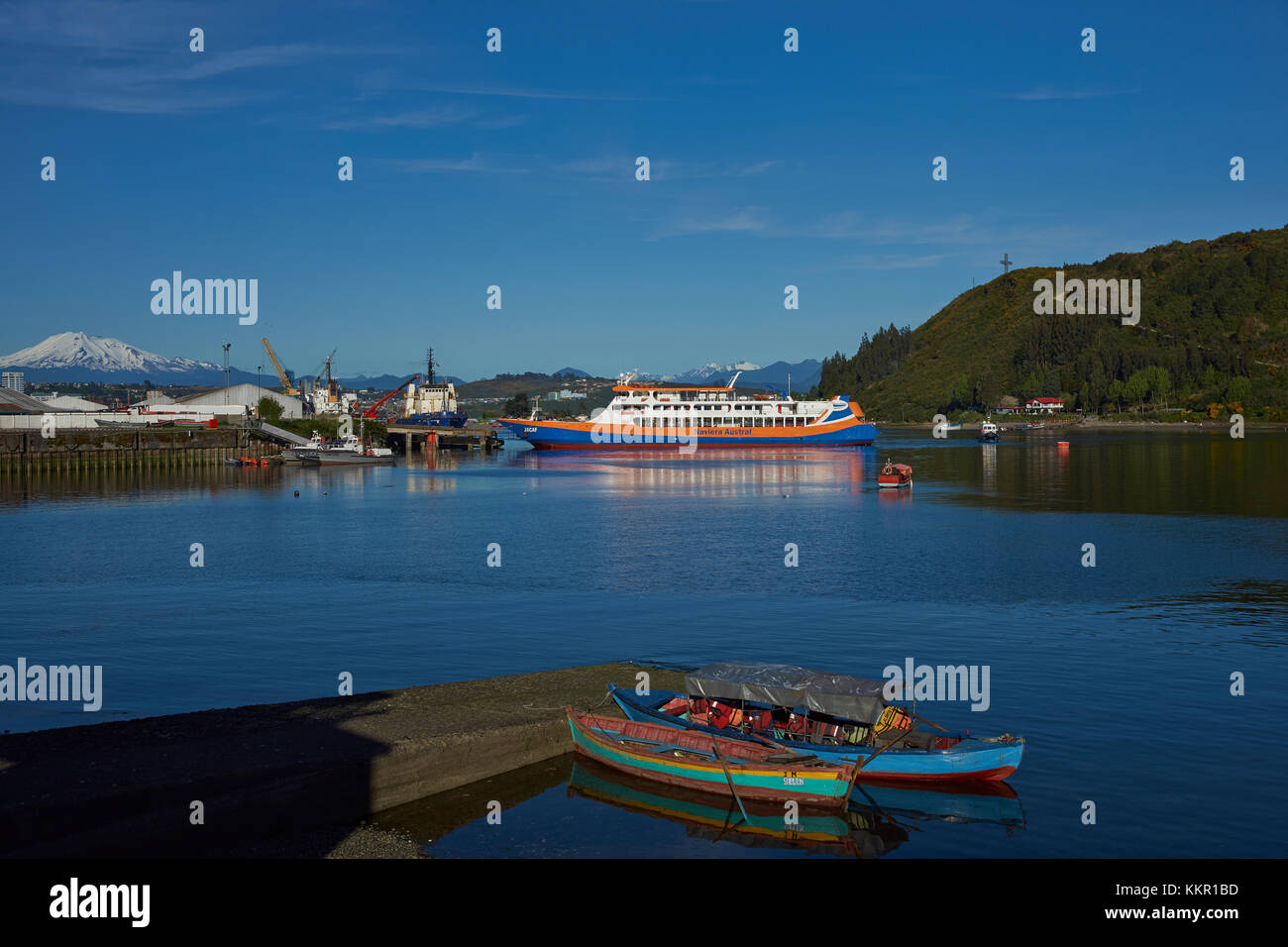 Ferry approaching the loading ramp in preparation for embarking ...