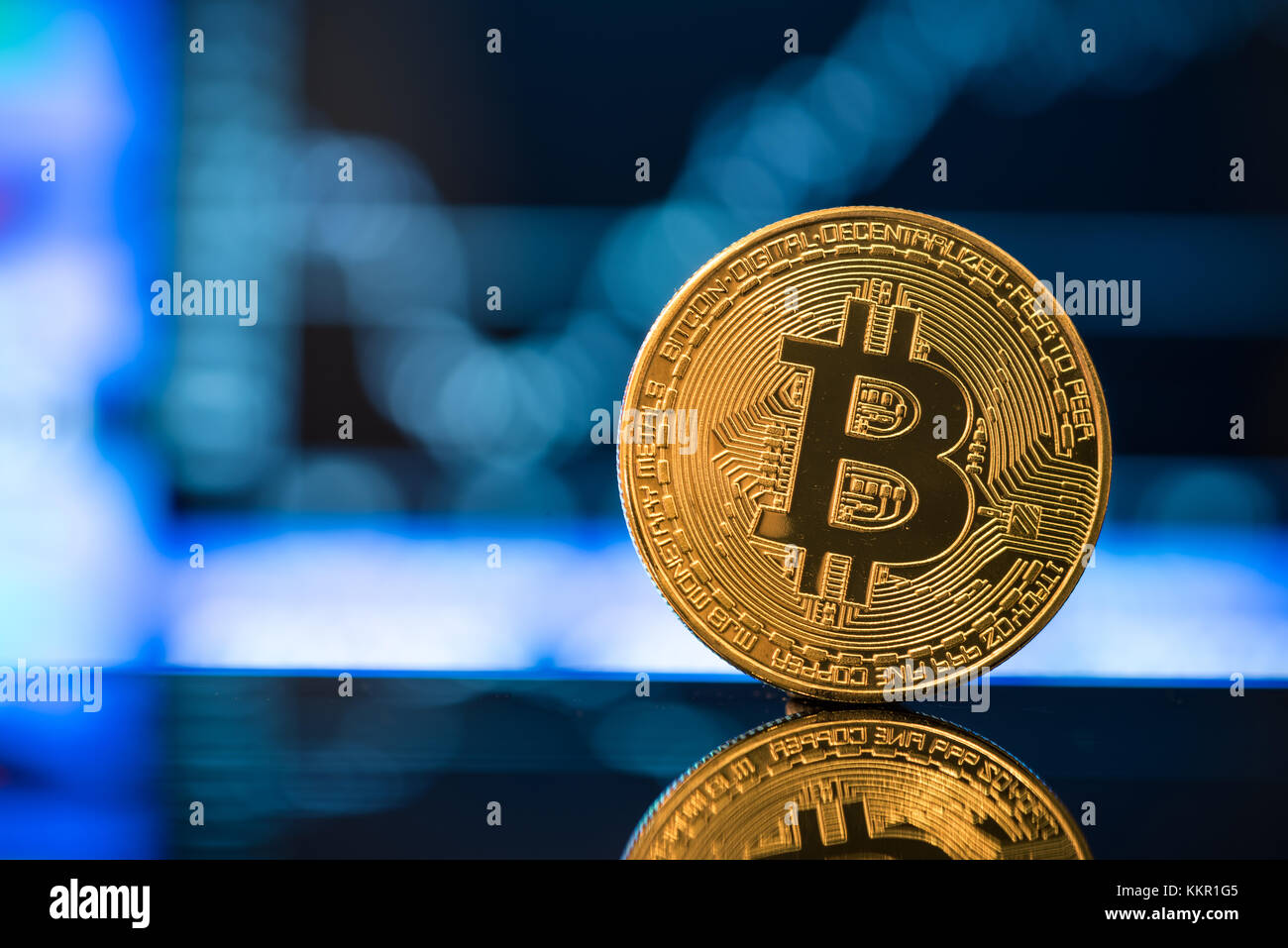 Bitcoin currency and growth graph in blur background Stock Photo - Alamy