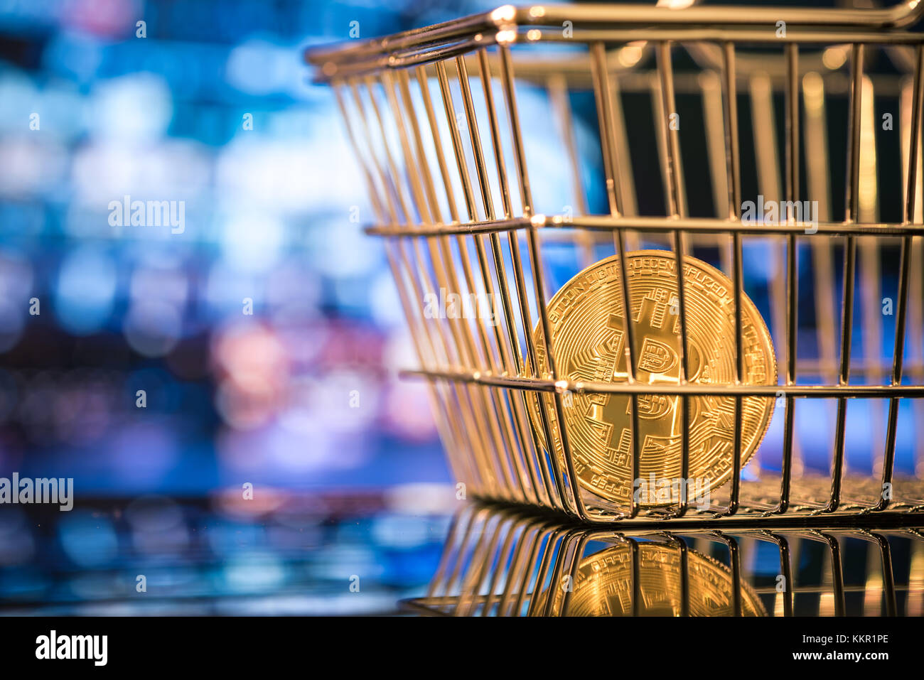 Bitcoin coin in shopping basket, e commerce concept Stock Photo - Alamy