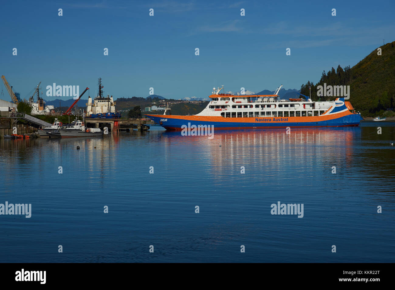 Ferry approaching the loading ramp in preparation for embarking ...