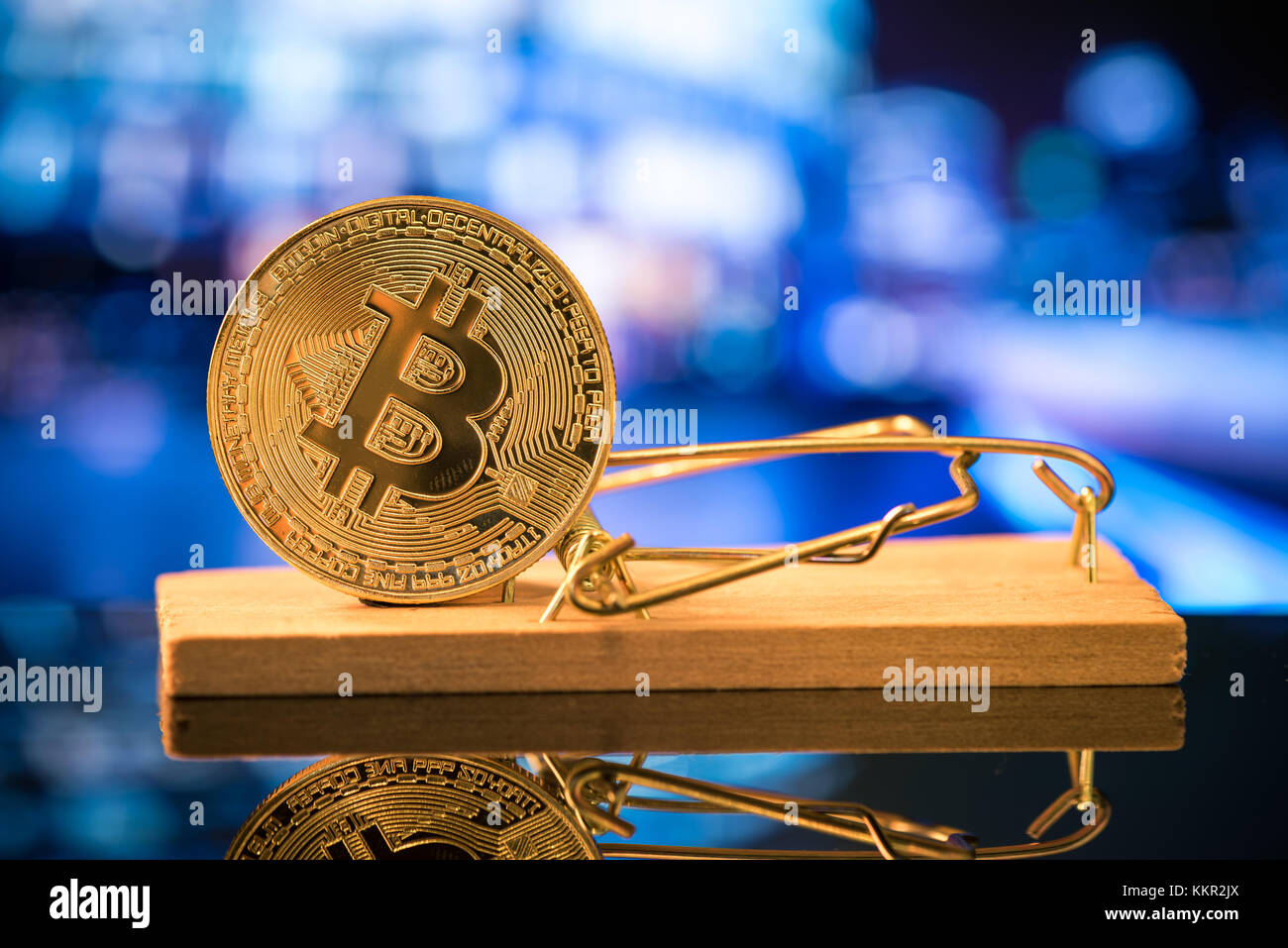 Bitcoin in mouse trat, financial trap concept Stock Photo - Alamy