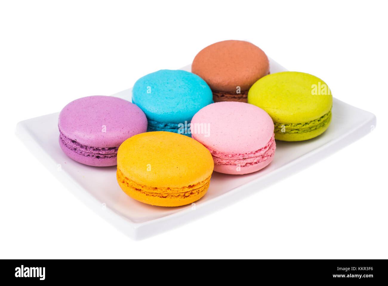 Macaroni tasty French dessert on white plate Stock Photo - Alamy