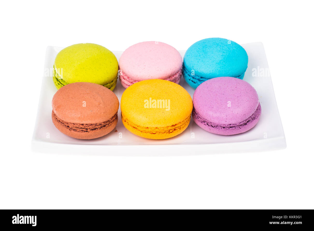 Macaroni tasty French dessert on white plate Stock Photo - Alamy