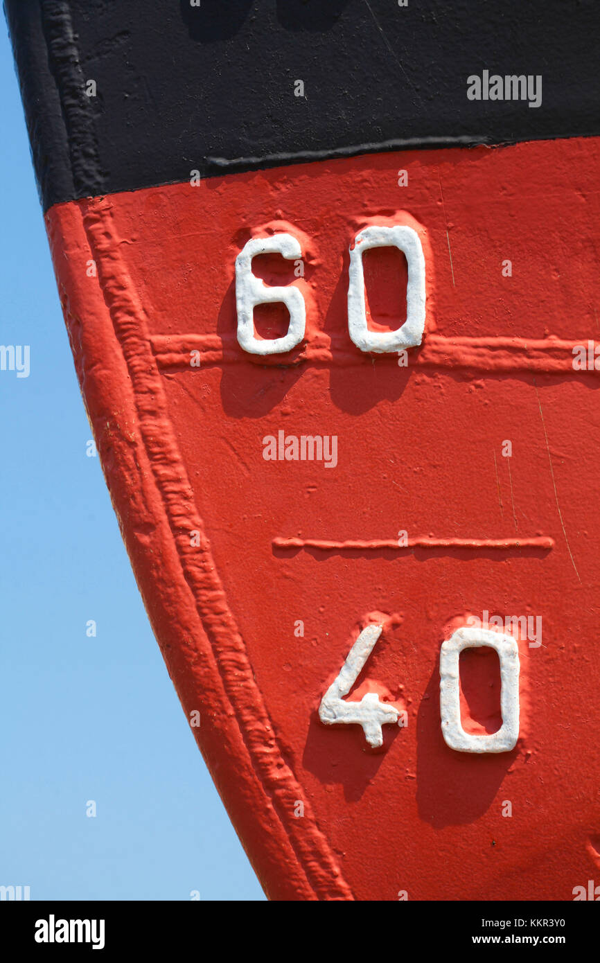 Water level marking at a red ships bow hi-res stock photography and ...