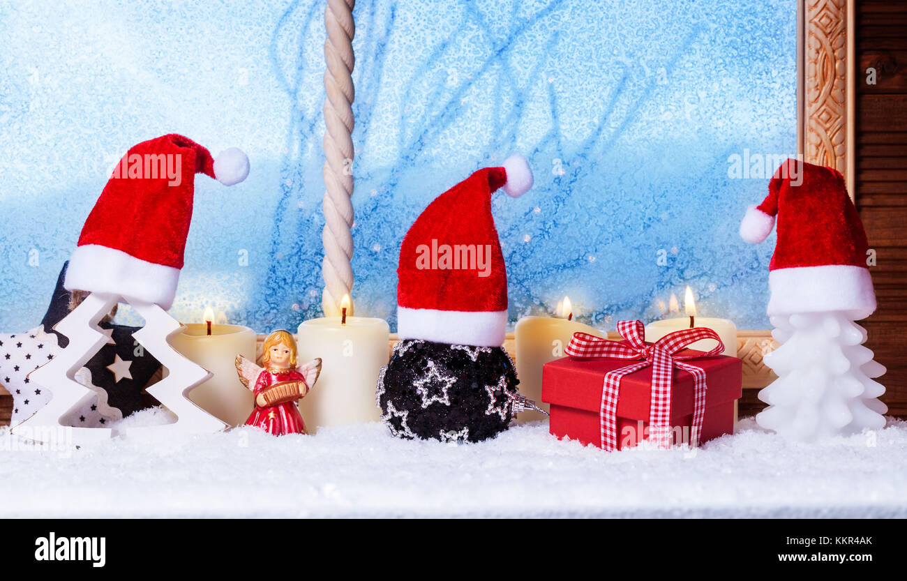 Christmas nats, candles, present, angel Stock Photo - Alamy