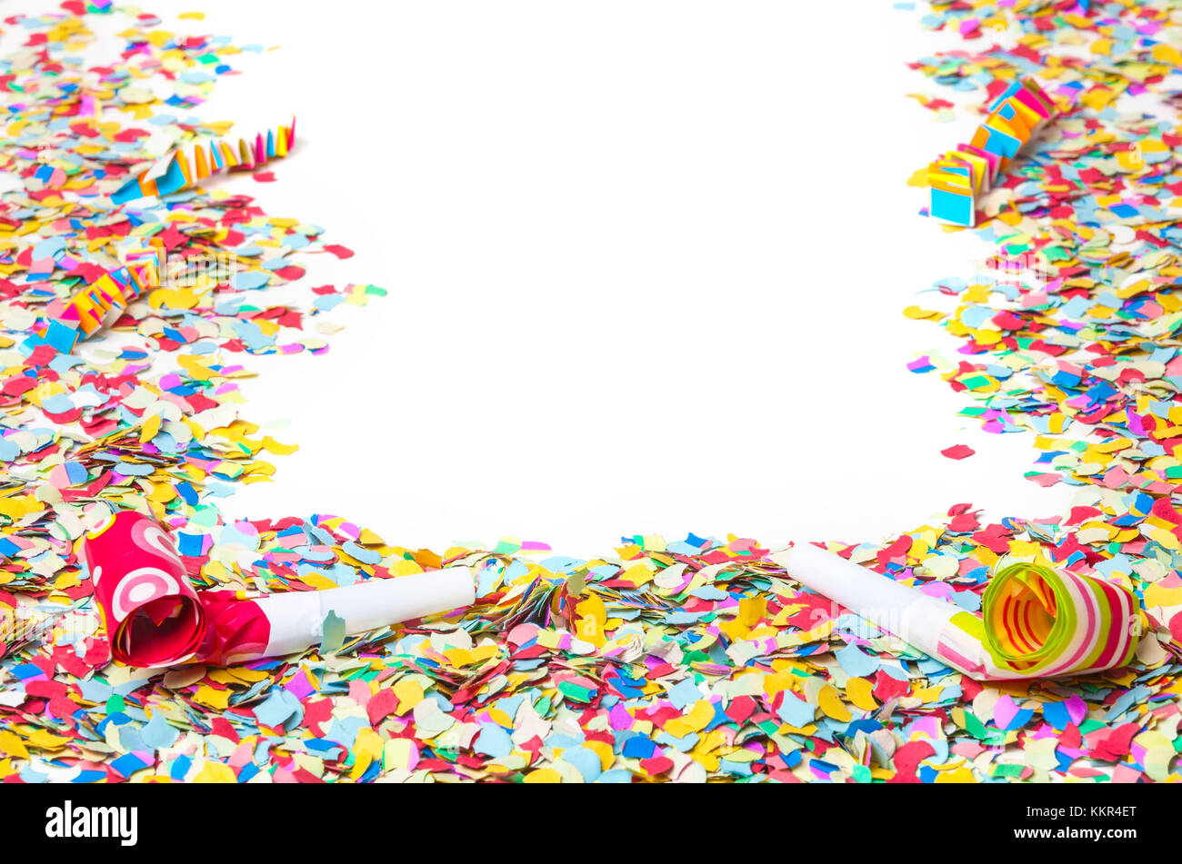 Confetti, party horns Stock Photo - Alamy